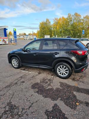 Black Mazda CX-5 2012 in Tallinn, with an engine capacity of 2.20 L and mileage of 253 thousand km for 9500 €, photo 4 on AUTOMOTO.COM.LV