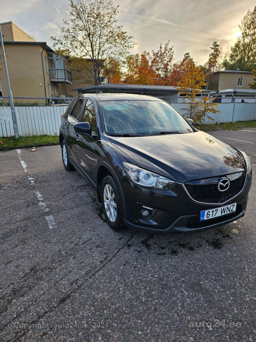Black Mazda CX-5 2012 in Tallinn, with an engine capacity of 2.20 L and mileage of 253 thousand km for 9500 €, photo 5 on AUTOMOTO.COM.LV