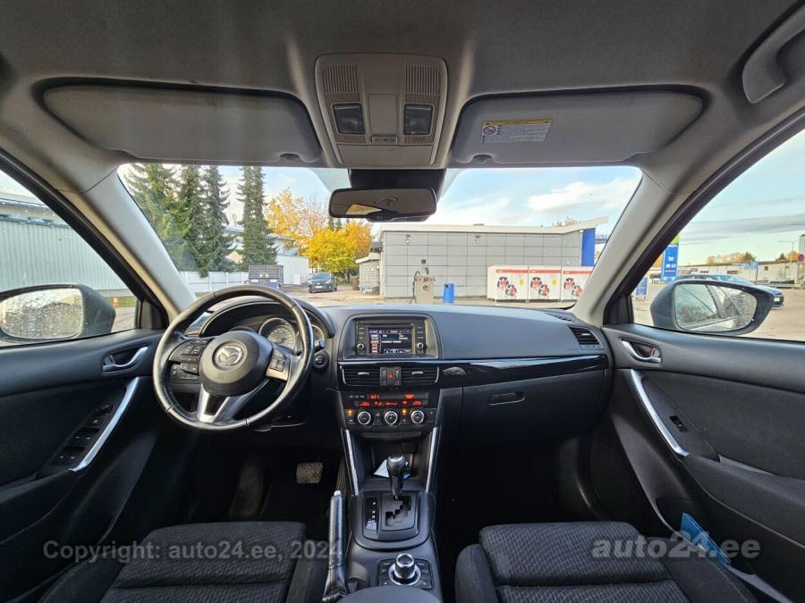 Black Mazda CX-5 2012 in Tallinn, with an engine capacity of 2.20 L and mileage of 253 thousand km for 9500 €, photo 6 on AUTOMOTO.COM.LV