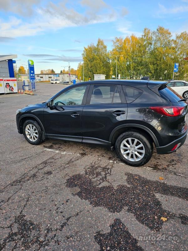Black Mazda CX-5 2012 in Tallinn, with an engine capacity of 2.20 L and mileage of 253 thousand km for 9500 €, photo 4 on AUTOMOTO.COM.LV