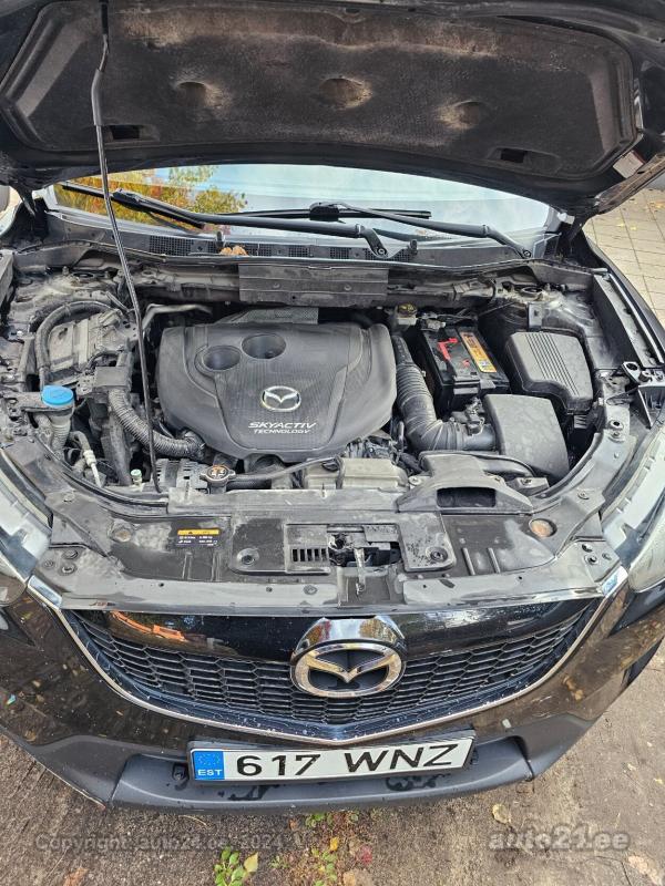 Black Mazda CX-5 2012 in Tallinn, with an engine capacity of 2.20 L and mileage of 253 thousand km for 9500 €, photo 11 on AUTOMOTO.COM.LV