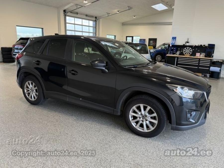 Black Mazda CX-5 2012 in Tallinn, with an engine capacity of 2.00 L and mileage of 250 thousand km for 6000 €, photo 1 on AUTOMOTO.COM.LV