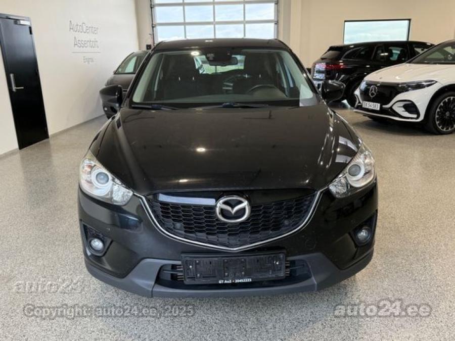 Black Mazda CX-5 2012 in Tallinn, with an engine capacity of 2.00 L and mileage of 250 thousand km for 6000 €, photo 5 on AUTOMOTO.COM.LV