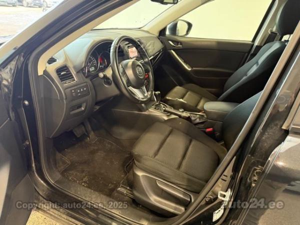 Melns Mazda CX-5 2012 Tallina, ar dzinēja tilpumu 2.00 L un nobraukumu 250 tūkst. km par 6000 €, foto 11 vietnē AUTOMOTO.COM.LV