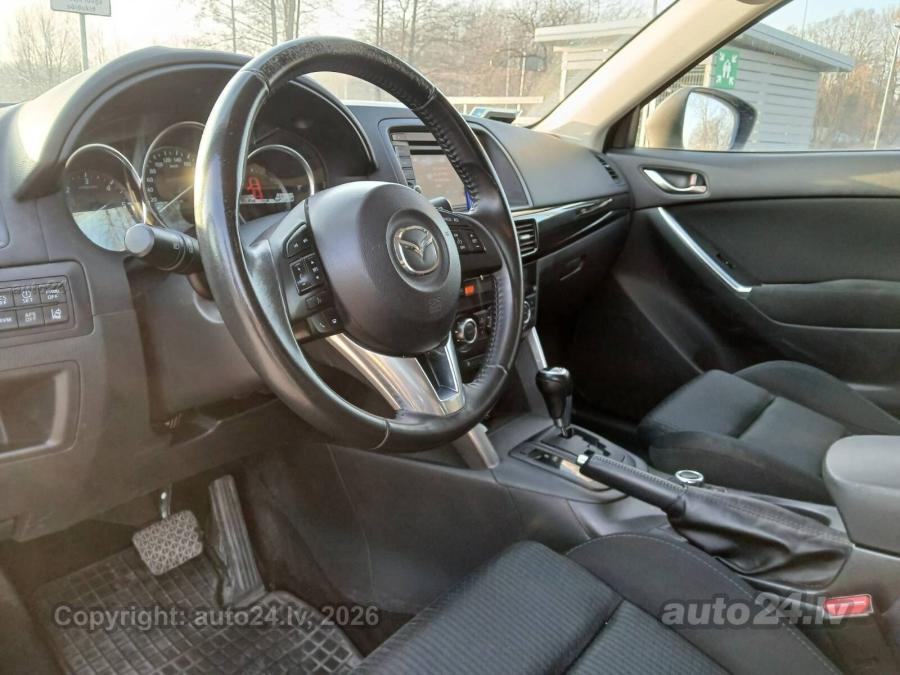 Black Mazda CX-5 2012 in Tallinn, with an engine capacity of 2.20 L and mileage of 128 thousand km for 7000 €, photo 5 on AUTOMOTO.COM.LV