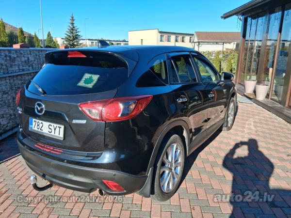 Black Mazda CX-5 2013 in Tallinn, with an engine capacity of 2.20 L and mileage of 214 thousand km for 9200 €, photo 3 on AUTOMOTO.COM.LV