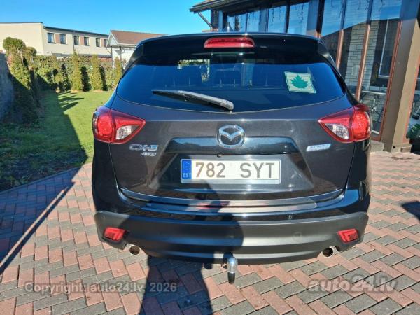 Black Mazda CX-5 2013 in Tallinn, with an engine capacity of 2.20 L and mileage of 214 thousand km for 9200 €, photo 4 on AUTOMOTO.COM.LV