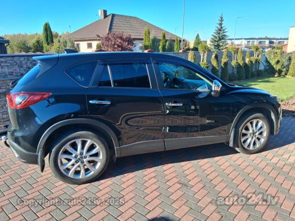 Black Mazda CX-5 2013 in Tallinn, with an engine capacity of 2.20 L and mileage of 214 thousand km for 9200 €, photo 5 on AUTOMOTO.COM.LV