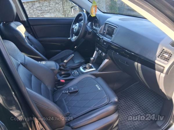 Black Mazda CX-5 2013 in Tallinn, with an engine capacity of 2.20 L and mileage of 214 thousand km for 9200 €, photo 6 on AUTOMOTO.COM.LV