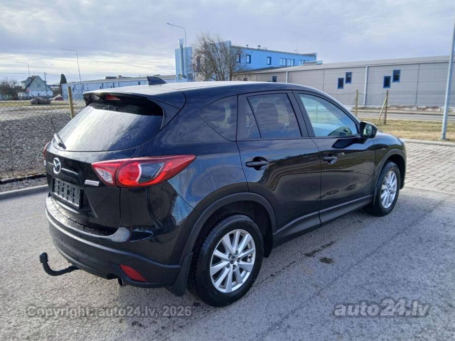 Melns Mazda CX-5 2013 Rakvere, ar dzinēja tilpumu 2.20 L un nobraukumu 310 tūkst. km par 6590 €, foto 2 vietnē AUTOMOTO.COM.LV