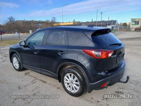 Melns Mazda CX-5 2013 Rakvere, ar dzinēja tilpumu 2.20 L un nobraukumu 310 tūkst. km par 6590 €, foto 4 vietnē AUTOMOTO.COM.LV
