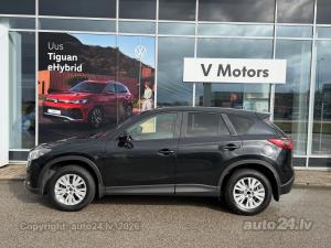Black Mazda CX-5 2013 in Viljandi, with an engine capacity of 2.20 L and mileage of 296 thousand km for 6990 €, photo 6 on AUTOMOTO.COM.LV