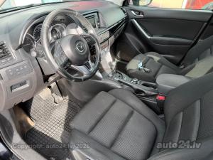 Black Mazda CX-5 2013 in Viljandi, with an engine capacity of 2.20 L and mileage of 296 thousand km for 6990 €, photo 7 on AUTOMOTO.COM.LV