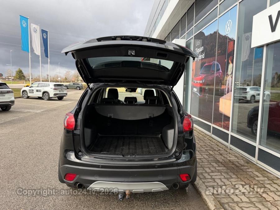 Black Mazda CX-5 2013 in Viljandi, with an engine capacity of 2.20 L and mileage of 296 thousand km for 6990 €, photo 10 on AUTOMOTO.COM.LV
