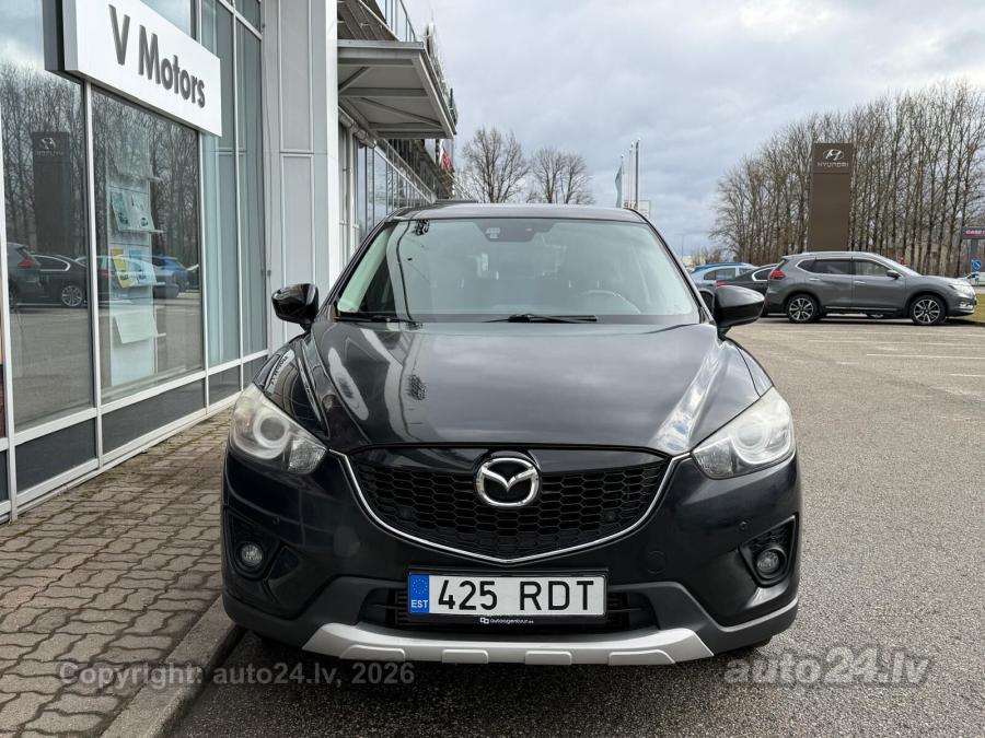 Black Mazda CX-5 2013 in Viljandi, with an engine capacity of 2.20 L and mileage of 296 thousand km for 6990 €, photo 13 on AUTOMOTO.COM.LV