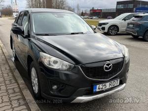 Black Mazda CX-5 2013 in Viljandi, with an engine capacity of 2.20 L and mileage of 296 thousand km for 6990 €, photo 14 on AUTOMOTO.COM.LV