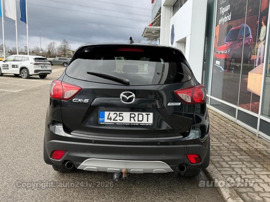 Black Mazda CX-5 2013 in Viljandi, with an engine capacity of 2.20 L and mileage of 296 thousand km for 6990 €, photo 16 on AUTOMOTO.COM.LV