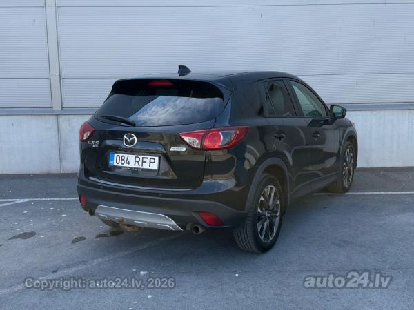 Black Mazda CX-5 2013 in Tartu, with an engine capacity of 2.20 L and mileage of 259 thousand km for 6700 €, photo 4 on AUTOMOTO.COM.LV