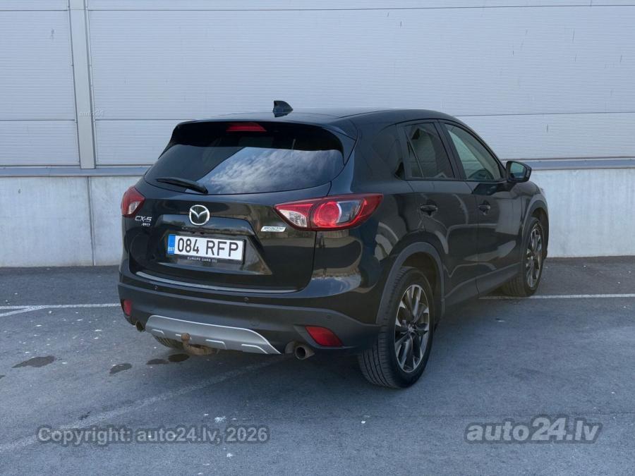 Black Mazda CX-5 2013 in Tartu, with an engine capacity of 2.20 L and mileage of 259 thousand km for 6700 €, photo 5 on AUTOMOTO.COM.LV