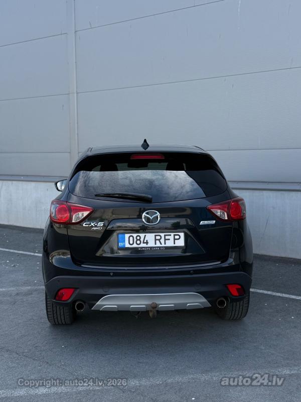 Black Mazda CX-5 2013 in Tartu, with an engine capacity of 2.20 L and mileage of 259 thousand km for 6700 €, photo 5 on AUTOMOTO.COM.LV
