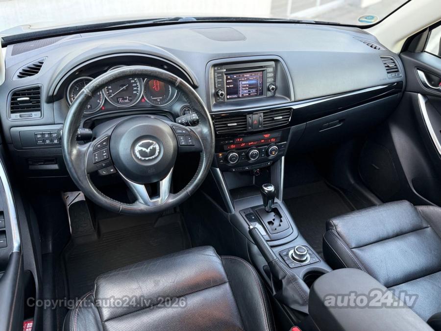 Black Mazda CX-5 2013 in Tartu, with an engine capacity of 2.20 L and mileage of 259 thousand km for 6700 €, photo 9 on AUTOMOTO.COM.LV
