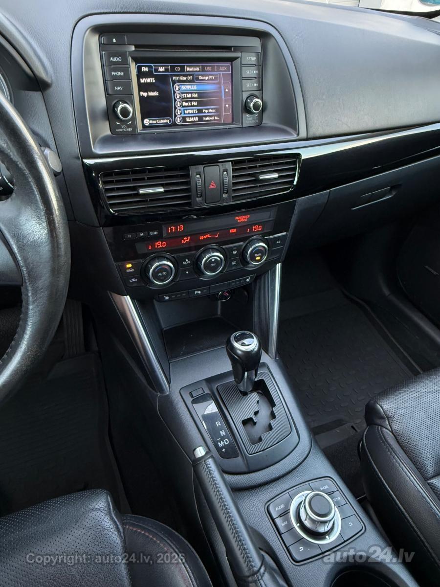 Black Mazda CX-5 2013 in Tartu, with an engine capacity of 2.20 L and mileage of 259 thousand km for 6700 €, photo 12 on AUTOMOTO.COM.LV