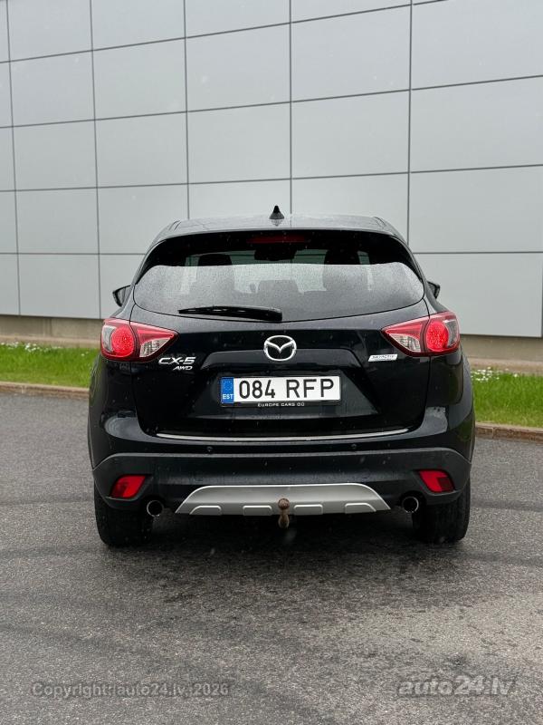 Black Mazda CX-5 2013 in Tartu, with an engine capacity of 2.20 L and mileage of 260 thousand km for 6200 €, photo 5 on AUTOMOTO.COM.LV