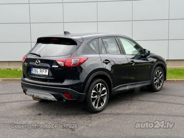 Black Mazda CX-5 2013 in Tartu, with an engine capacity of 2.20 L and mileage of 260 thousand km for 6200 €, photo 6 on AUTOMOTO.COM.LV