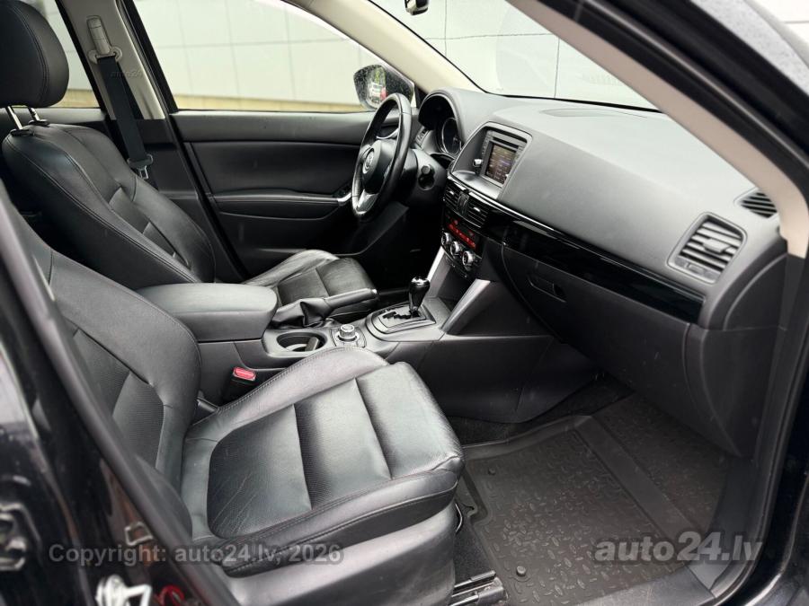 Melns Mazda CX-5 2013 Tartu, ar dzinēja tilpumu 2.20 L un nobraukumu 260 tūkst. km par 6200 €, foto 12 vietnē AUTOMOTO.COM.LV