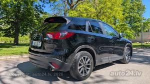Black Mazda CX-5 2014 in Haapsalu, with an engine capacity of 2.20 L and mileage of 212 thousand km for 9500 €, photo 4 on AUTOMOTO.COM.LV