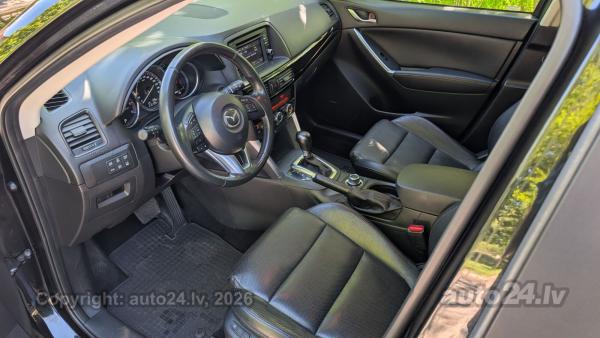 Black Mazda CX-5 2014 in Haapsalu, with an engine capacity of 2.20 L and mileage of 212 thousand km for 9500 €, photo 5 on AUTOMOTO.COM.LV