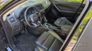 Black Mazda CX-5 2014 in Haapsalu, with an engine capacity of 2.20 L and mileage of 212 thousand km for 9500 €, photo 6 on AUTOMOTO.COM.LV