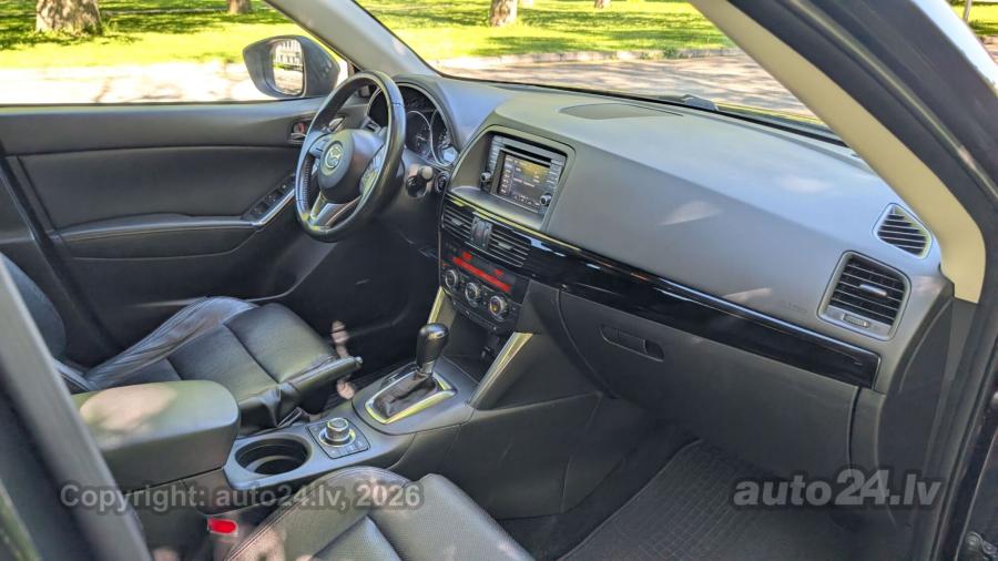 Black Mazda CX-5 2014 in Haapsalu, with an engine capacity of 2.20 L and mileage of 212 thousand km for 9500 €, photo 7 on AUTOMOTO.COM.LV