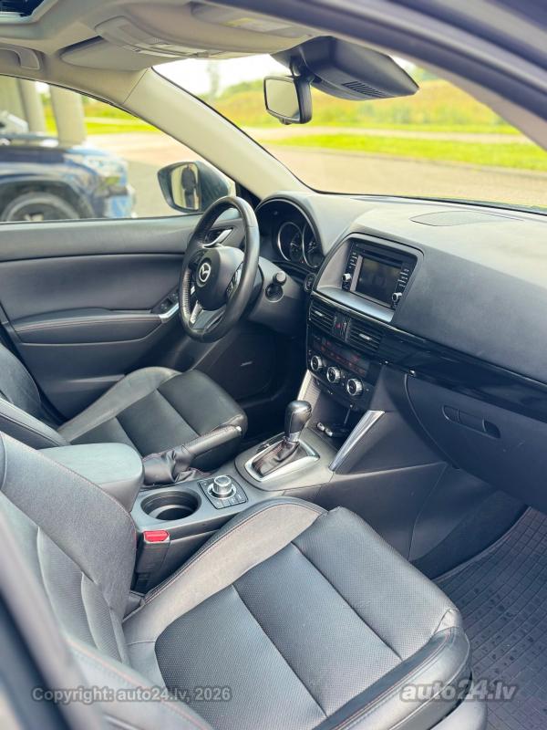 Black Mazda CX-5 2015 in Tallinn, with an engine capacity of 2.20 L and mileage of 120 thousand km for 9999 €, photo 9 on AUTOMOTO.COM.LV