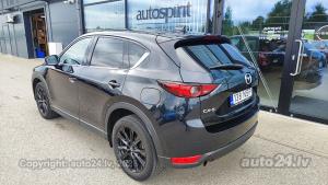 Black Mazda CX-5 2021 in Tartu, with an engine capacity of 2.50 L and mileage of 67 thousand km for 21990 €, photo 4 on AUTOMOTO.COM.LV