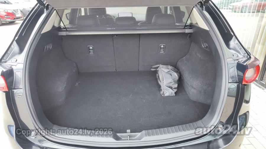 Black Mazda CX-5 2021 in Tartu, with an engine capacity of 2.50 L and mileage of 67 thousand km for 21990 €, photo 6 on AUTOMOTO.COM.LV