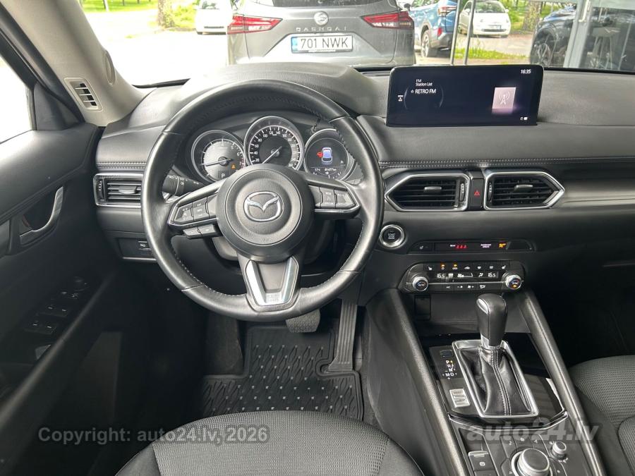 Black Mazda CX-5 2022 in Tallinn, with an engine capacity of 2.00 L and mileage of 81 thousand km for 24990 €, photo 6 on AUTOMOTO.COM.LV