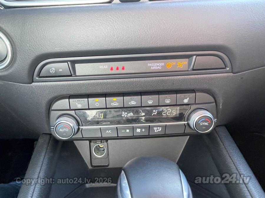 Melns Mazda CX-5 2024 Tartu, ar dzinēja tilpumu 2.00 L un nobraukumu 58 tūkst. km par 29990 €, foto 16 vietnē AUTOMOTO.COM.LV