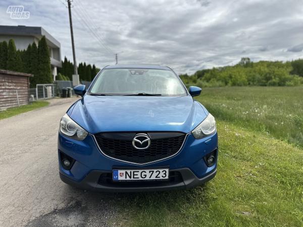 Zils Mazda CX-5 2012 Panevēža, ar dzinēja tilpumu 2.20 L un nobraukumu 217 tūkst. km par 7200 €, foto 5 vietnē AUTOMOTO.COM.LV