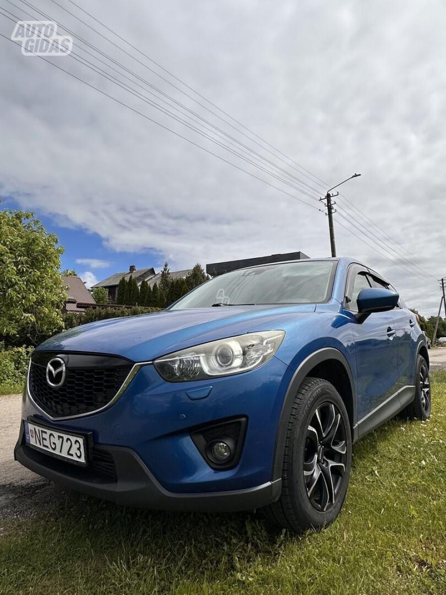 Blue Mazda CX-5 2012 in Panevezys, with an engine capacity of 2.20 L and mileage of 217 thousand km for 7200 €, photo 7 on AUTOMOTO.COM.LV