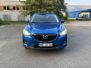 Blue Mazda CX-5 2012 in Ogre, with an engine capacity of 2.20 L and mileage of 133 thousand km for 6990 €, photo 3 on AUTOMOTO.COM.LV