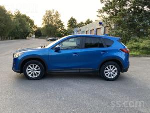 Blue Mazda CX-5 2012 in Ogre, with an engine capacity of 2.20 L and mileage of 133 thousand km for 6990 €, photo 5 on AUTOMOTO.COM.LV