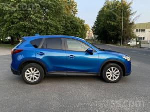 Blue Mazda CX-5 2012 in Ogre, with an engine capacity of 2.20 L and mileage of 133 thousand km for 6990 €, photo 6 on AUTOMOTO.COM.LV