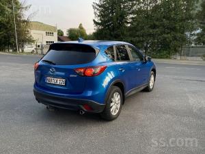 Blue Mazda CX-5 2012 in Ogre, with an engine capacity of 2.20 L and mileage of 133 thousand km for 6990 €, photo 9 on AUTOMOTO.COM.LV