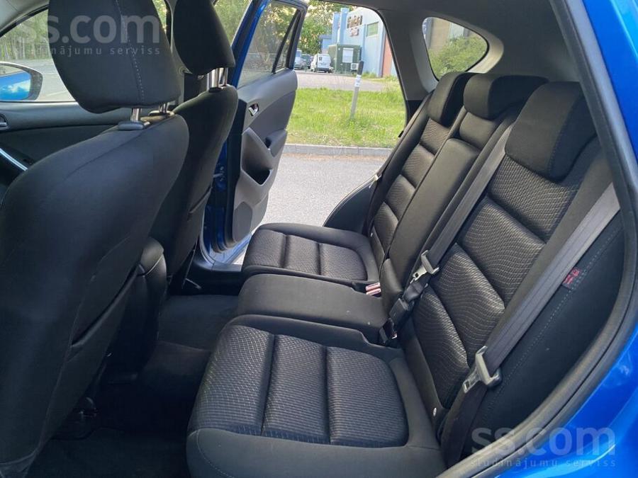 Blue Mazda CX-5 2012 in Ogre, with an engine capacity of 2.20 L and mileage of 133 thousand km for 6990 €, photo 16 on AUTOMOTO.COM.LV