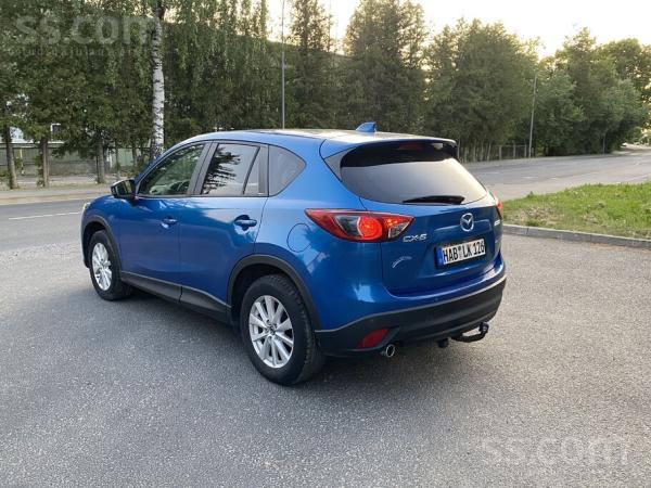 Zils Mazda CX-5 2012 Ogre, ar dzinēja tilpumu 2.20 L un nobraukumu 133 tūkst. km par 6850 €, foto 6 vietnē AUTOMOTO.COM.LV