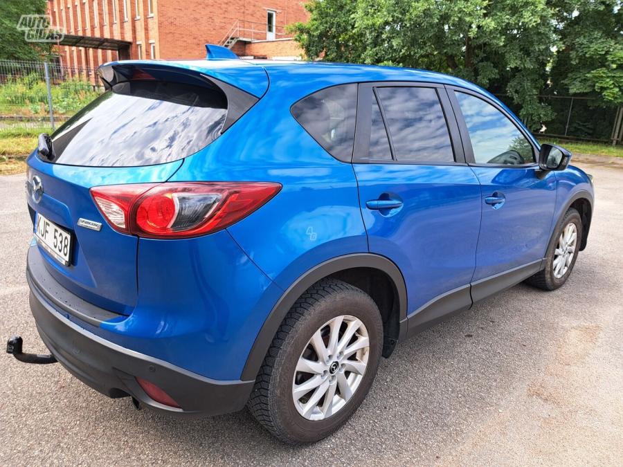 Zils Mazda CX-5 2012 Alīta, ar dzinēja tilpumu 2.20 L un nobraukumu 212 tūkst. km par 5800 €, foto 9 vietnē AUTOMOTO.COM.LV