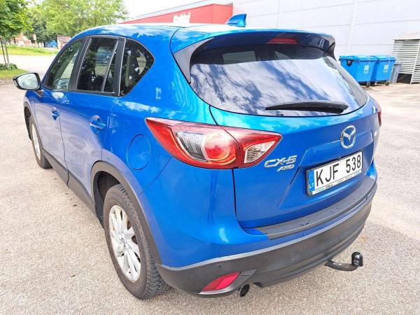 Blue Mazda CX-5 2012 in Alytus, with an engine capacity of 2.18 L and mileage of 212 thousand km for 5800 €, photo 5 on AUTOMOTO.COM.LV