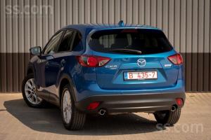 Zils Mazda CX-5 2012 Talsi, ar dzinēja tilpumu 2.20 L un nobraukumu 117 tūkst. km par 10950 €, foto 5 vietnē AUTOMOTO.COM.LV