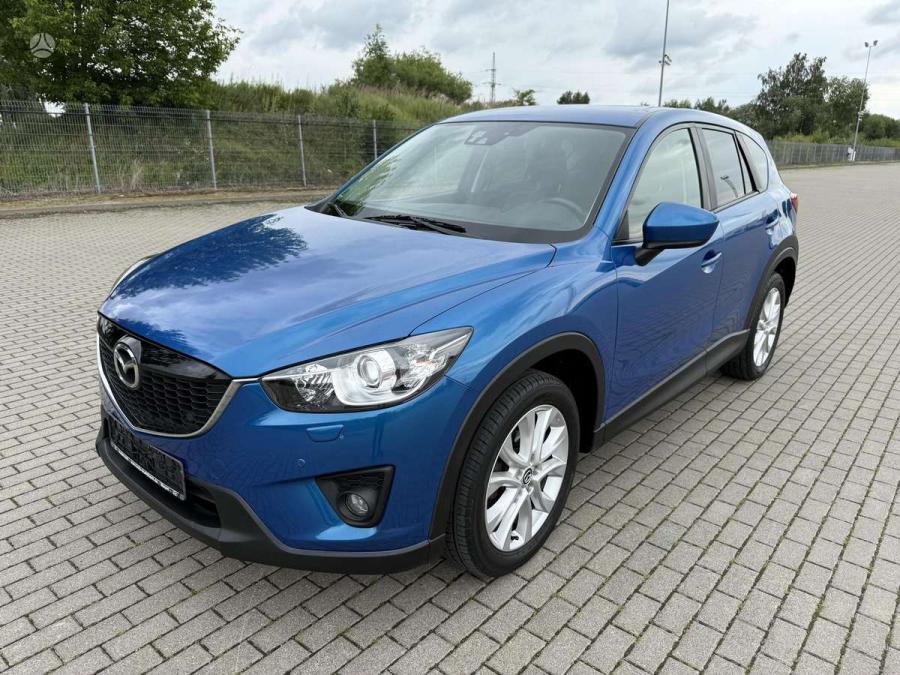 Zils Mazda CX-5 2012 Marijampole, ar dzinēja tilpumu 2.19 L un nobraukumu 179 tūkst. km par 6200 €, foto 1 vietnē AUTOMOTO.COM.LV
